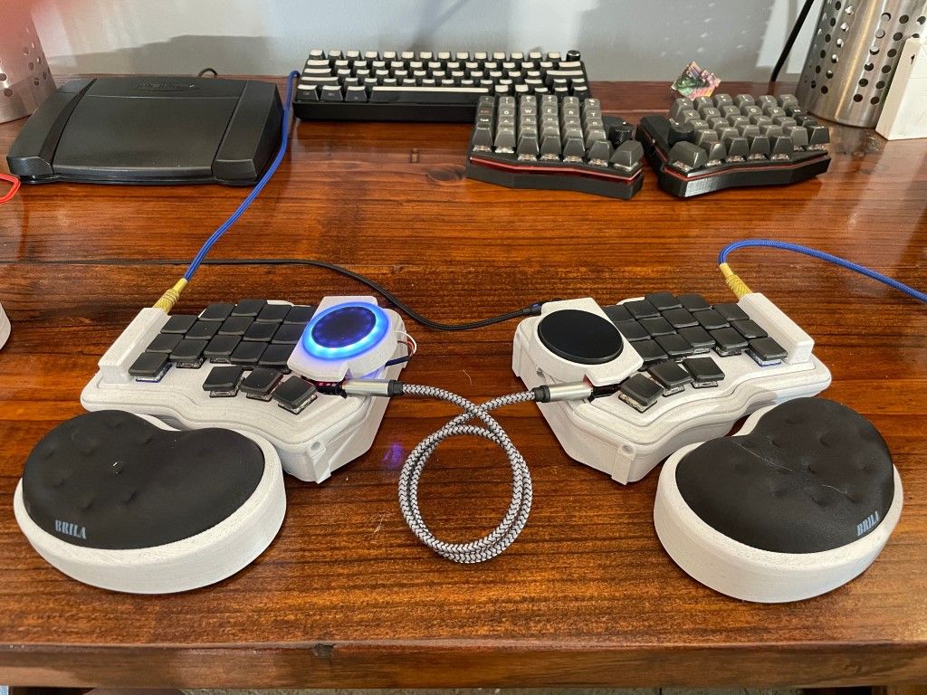 A Heavily Customized Piantor with GlidePoint Trackpad by a community member