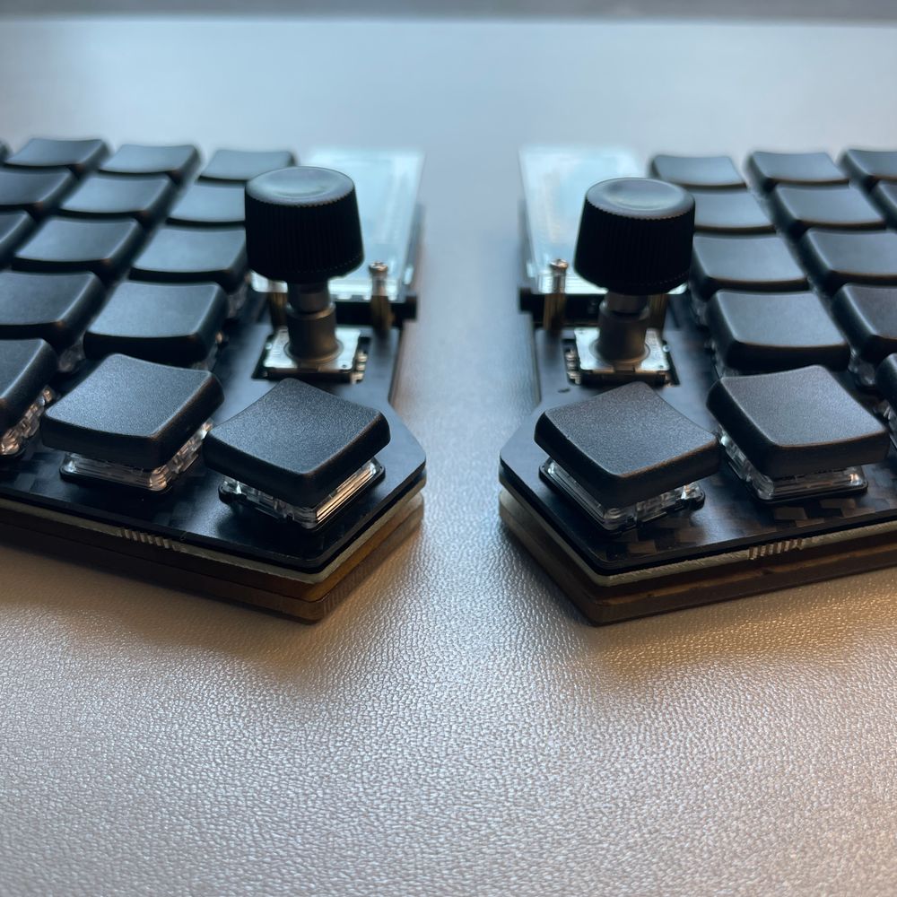 Trying different rotary encoders and knobs on split keyboards