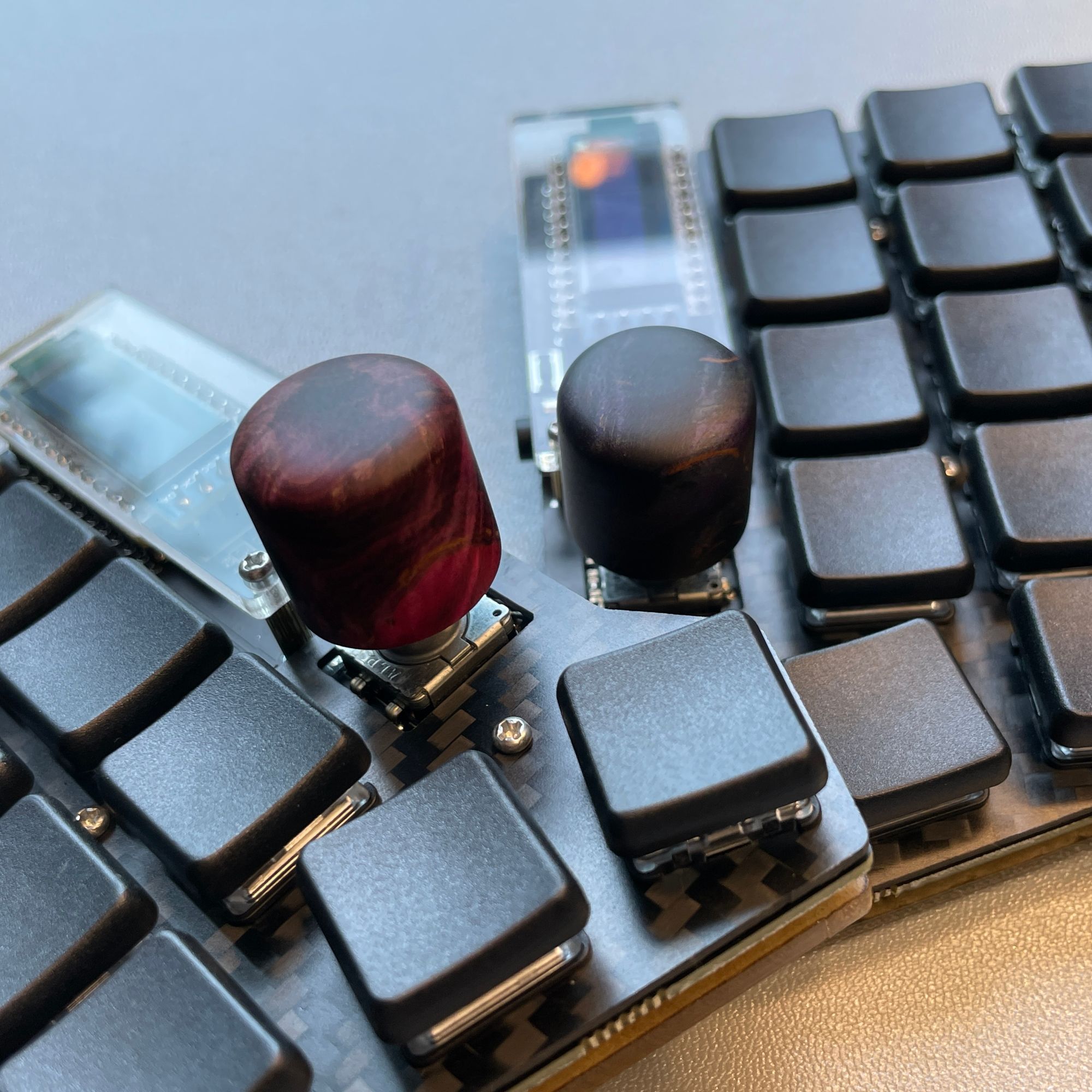 Trying different rotary encoders and knobs on split keyboards