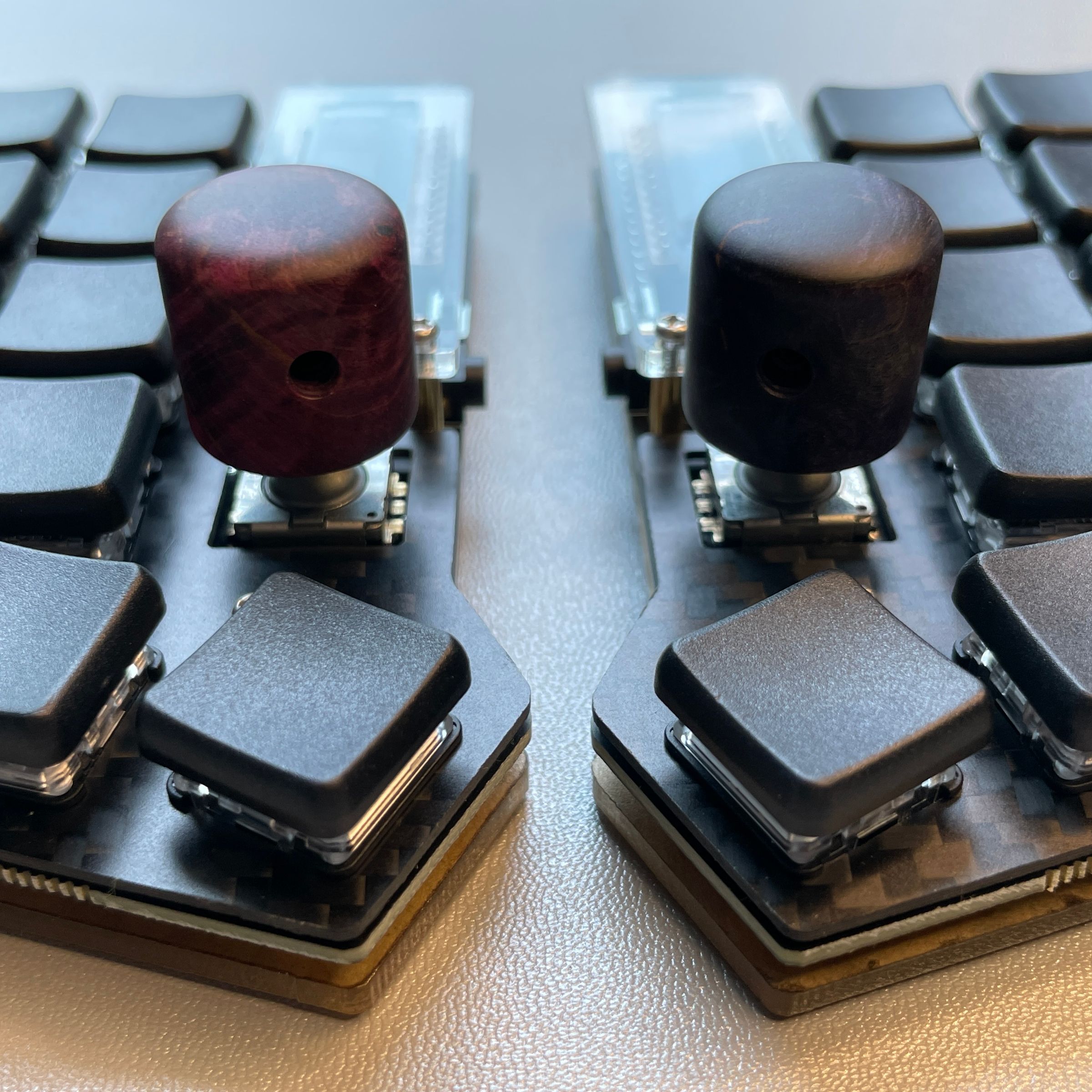 Trying different rotary encoders and knobs on split keyboards